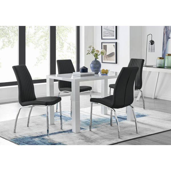 East Urban Home Eubanks High Gloss 4 Seat Rectangular Dining Table Set with Faux Leather ...